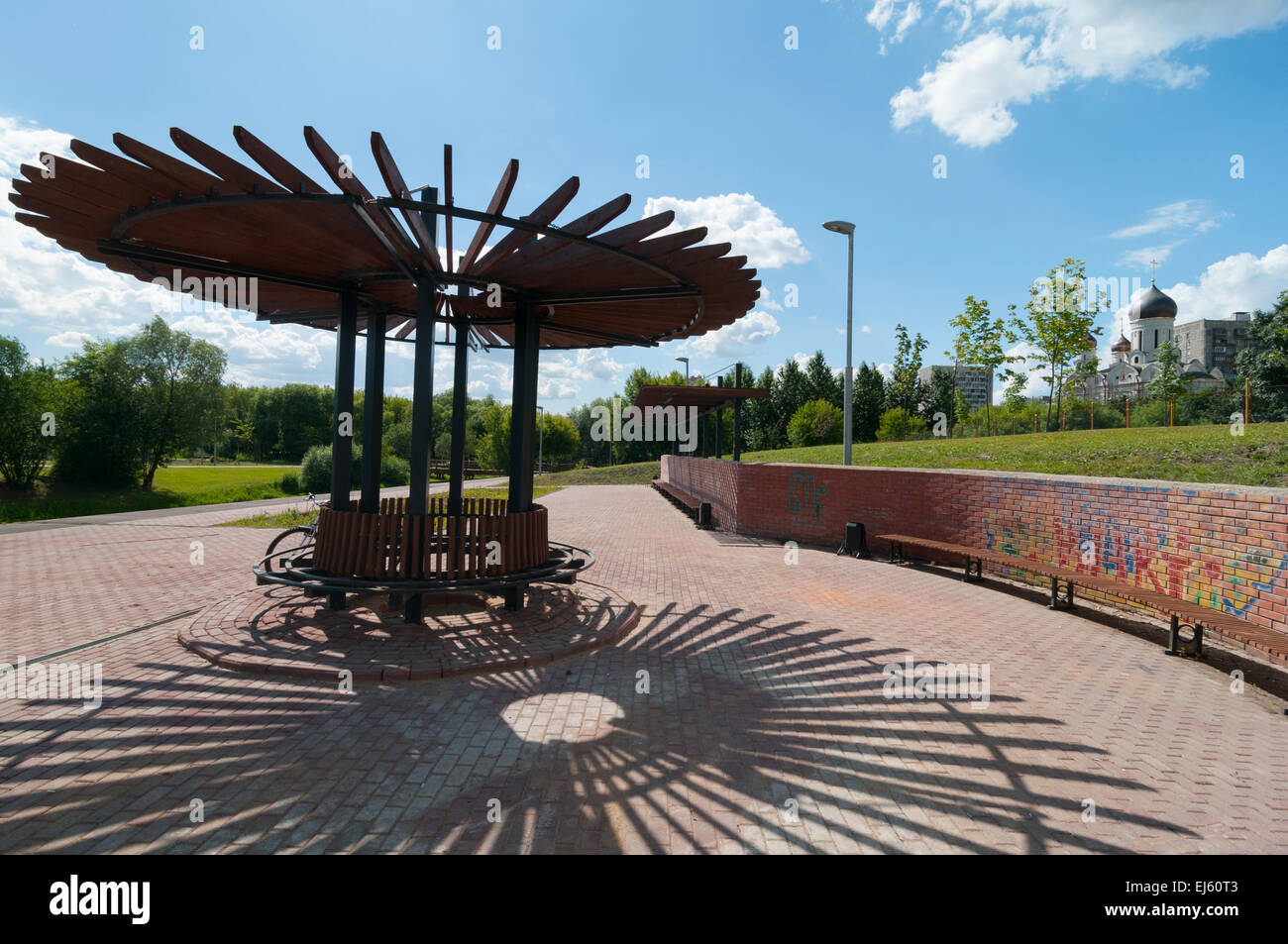 Round bench and shadow in north-eastern Moscow Stock Photo - Alamy