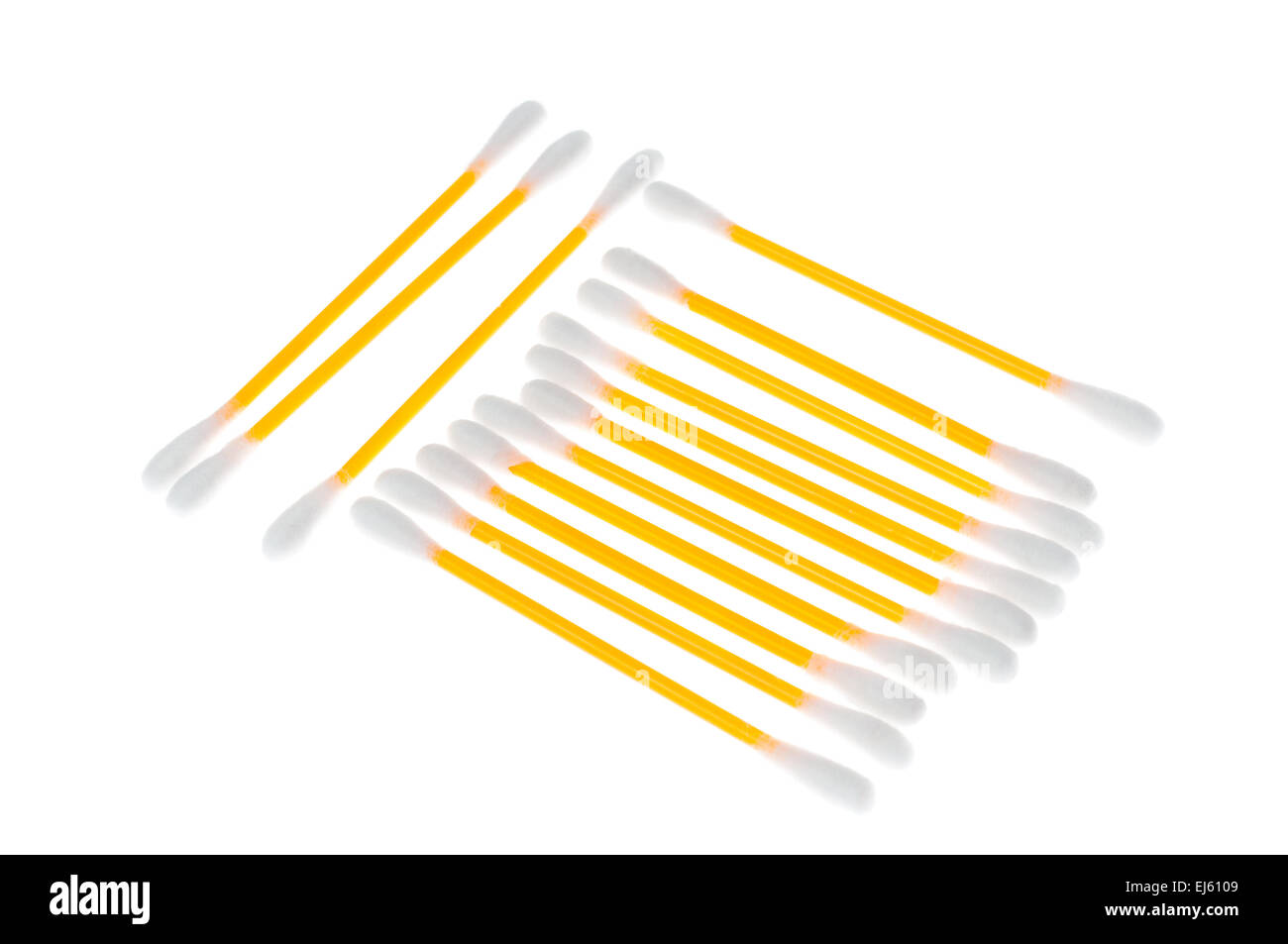 Yellow cotton swabs isolated on the white background Stock Photo - Alamy