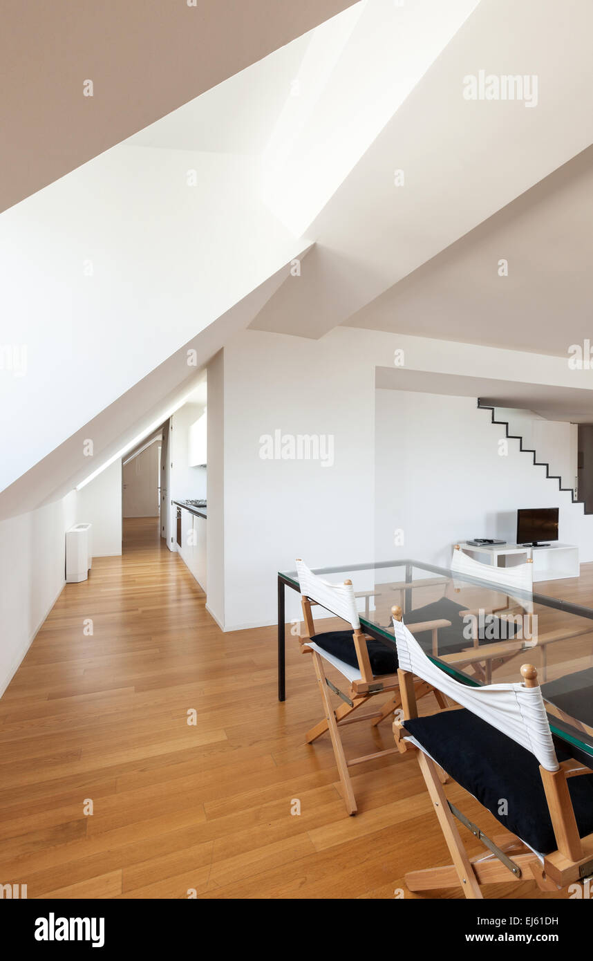 Interior, beautiful loft, hardwood floor, dining table Stock Photo - Alamy