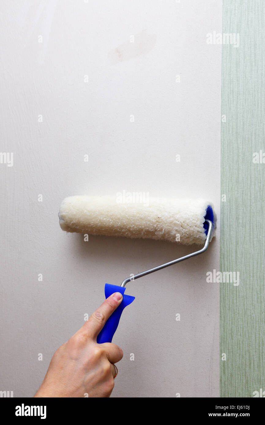 wall-paper hanging in the repair room Stock Photo - Alamy