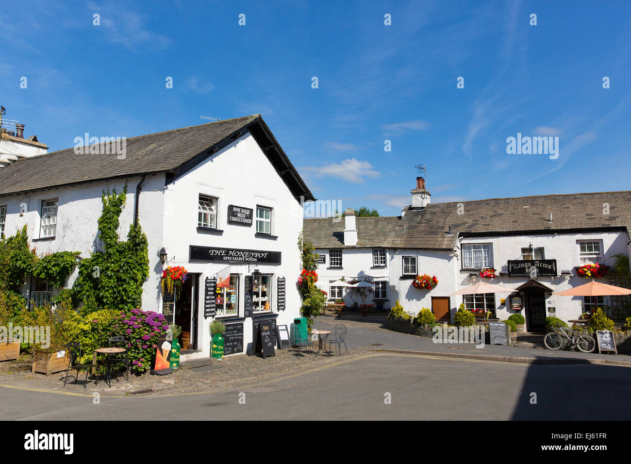 Hawkshead village street with shop and pub in the English Lake District ...