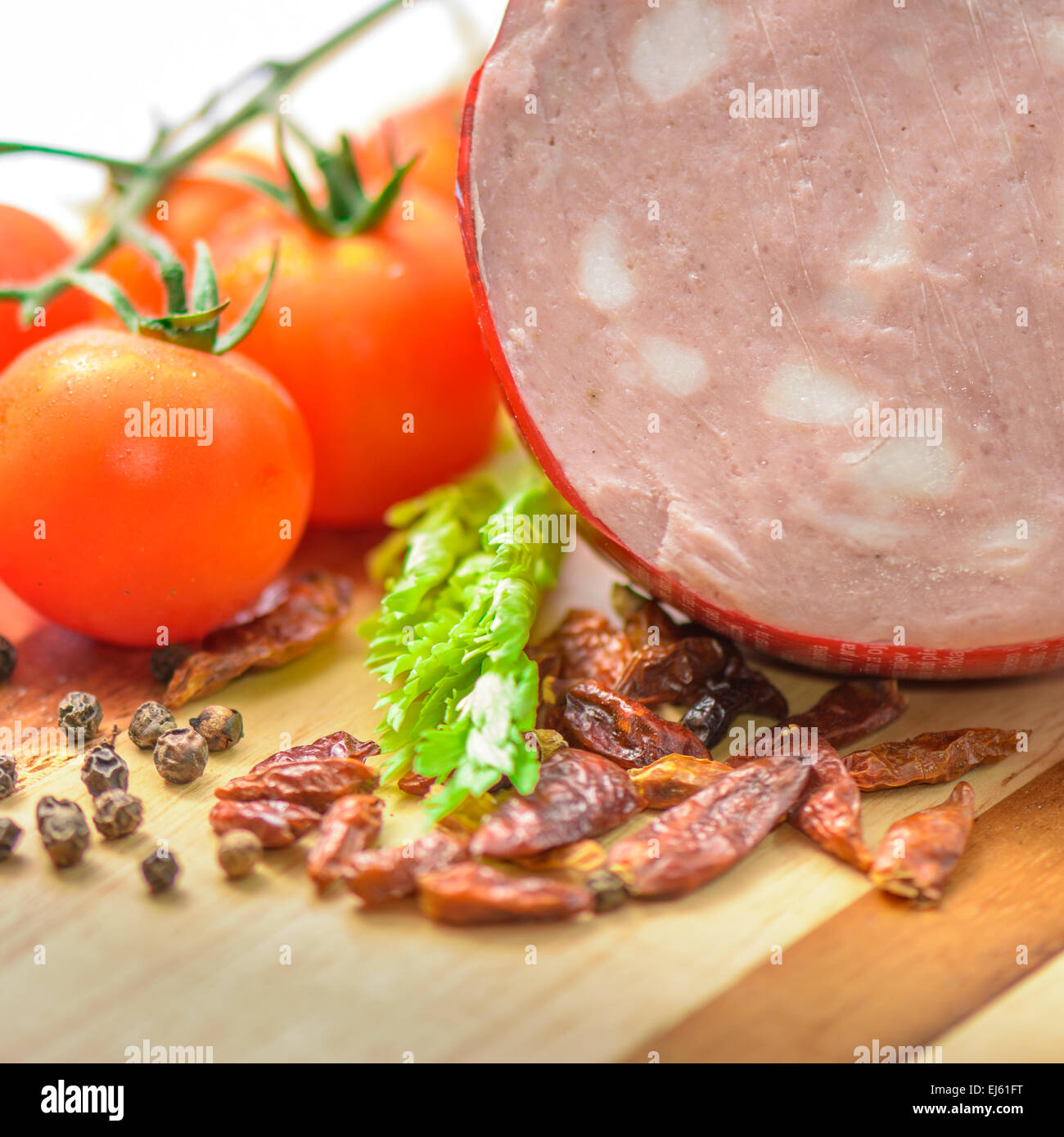 Italian Mortadella Bologna with tomatoes and vegetables Stock Photo - Alamy