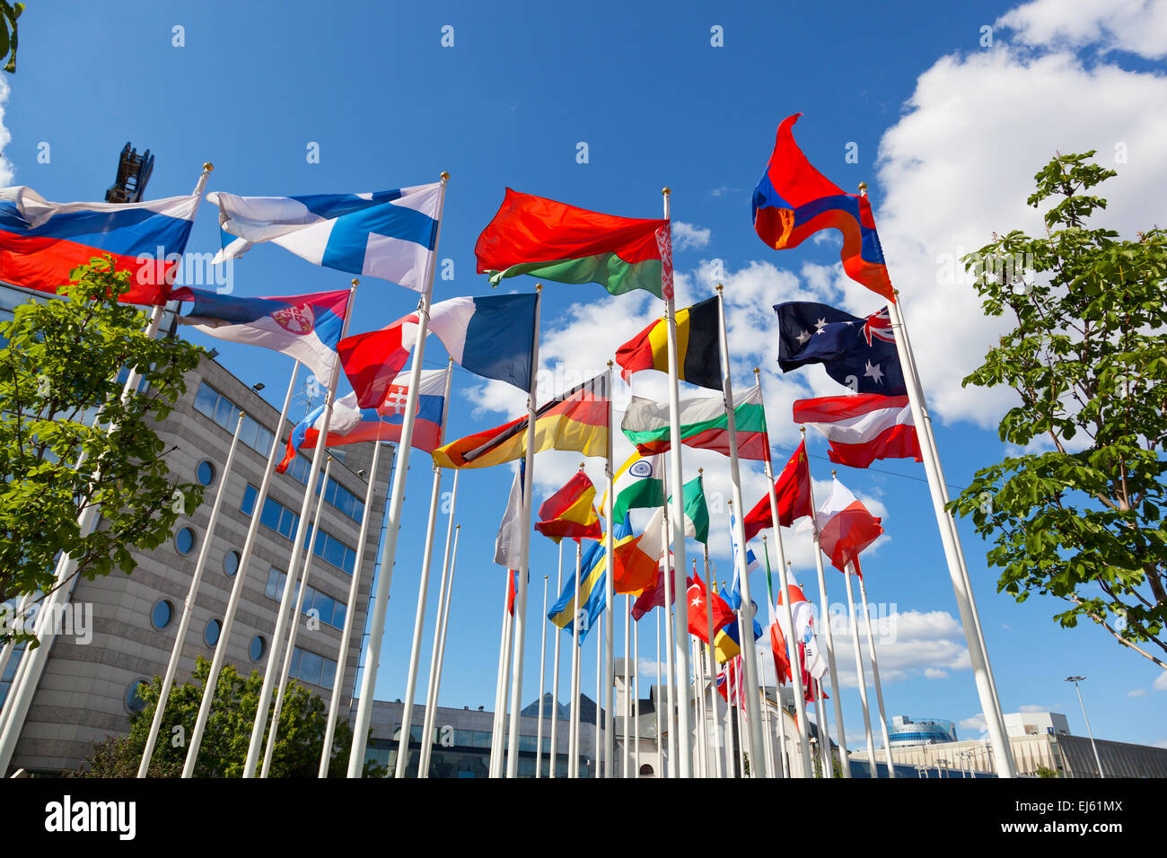Flags of the different countries on flagstaffs against the sky Stock ...