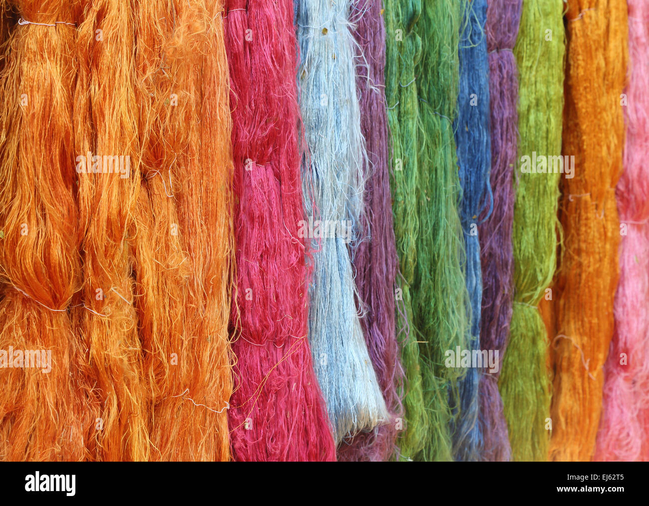 Colorful raw silk thread in the silk farm Stock Photo - Alamy