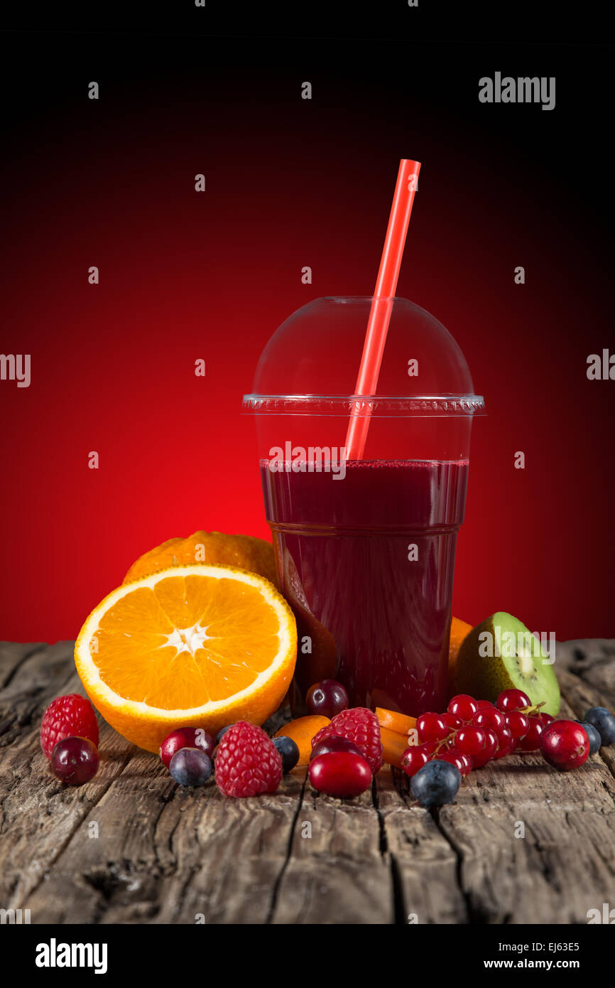 Fresh juice mix fruit, healthy drinks on wooden table Stock Photo - Alamy
