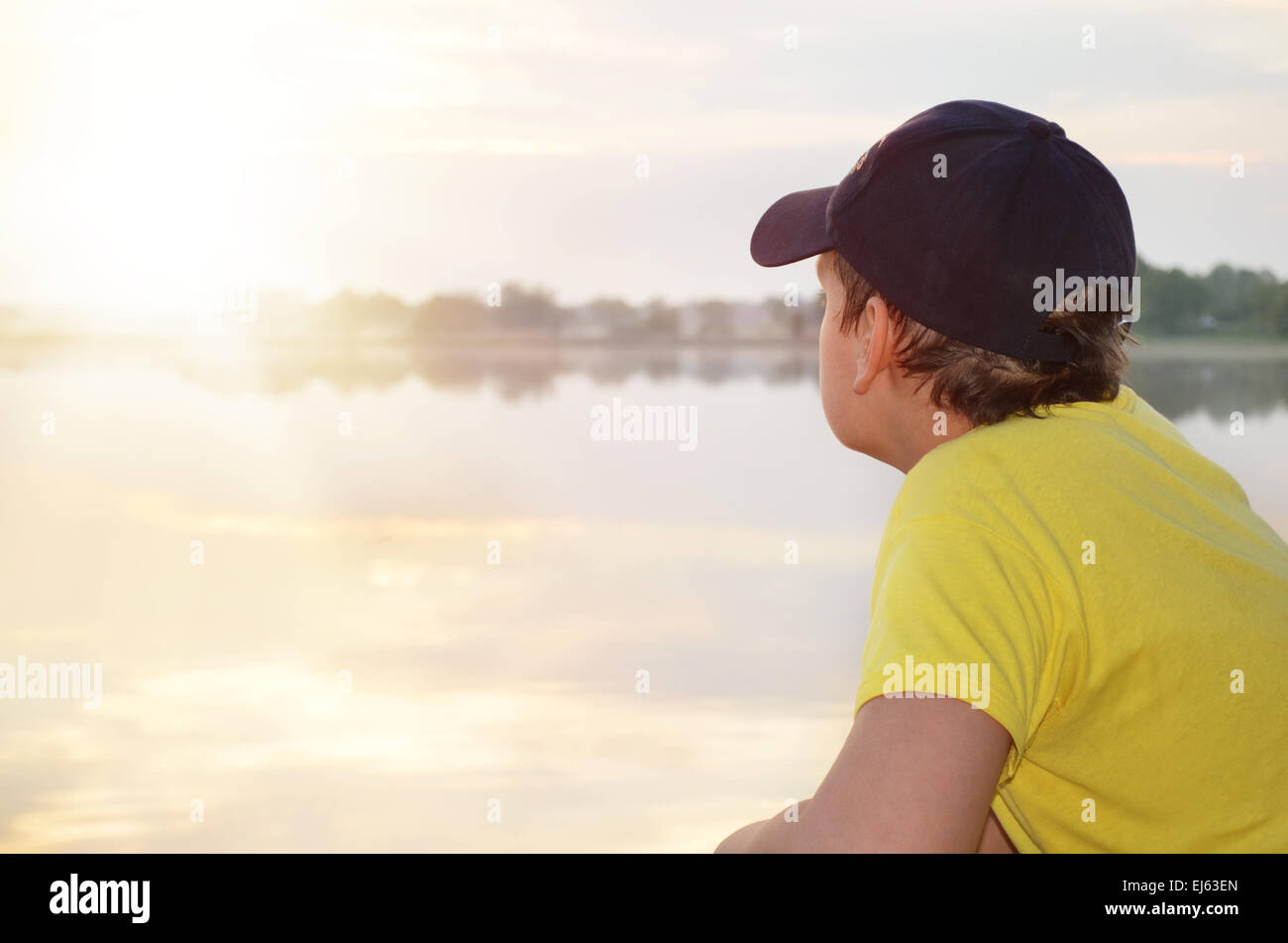 boy and the sunset Stock Photo - Alamy