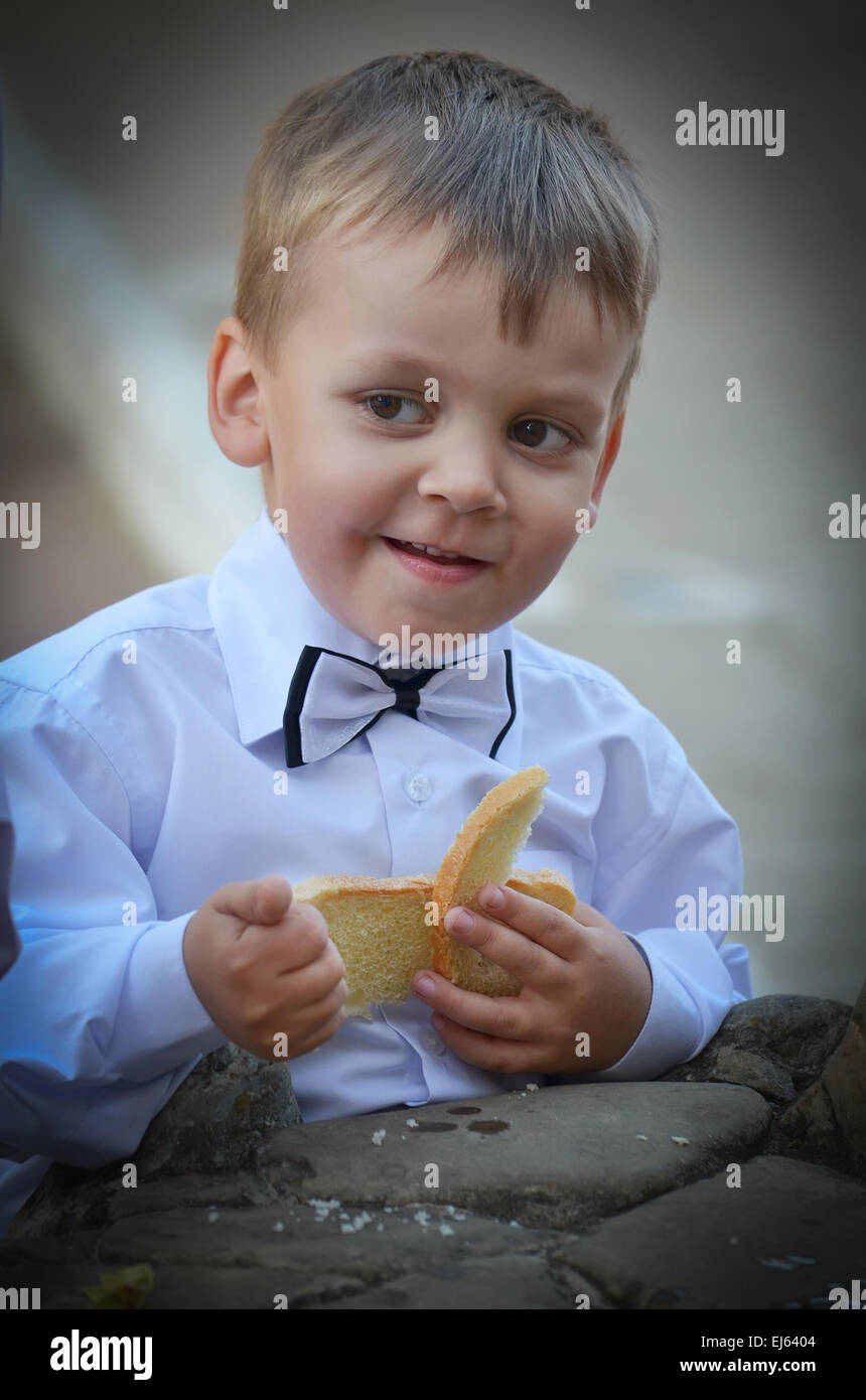 Boy in white hi-res stock photography and images - Alamy