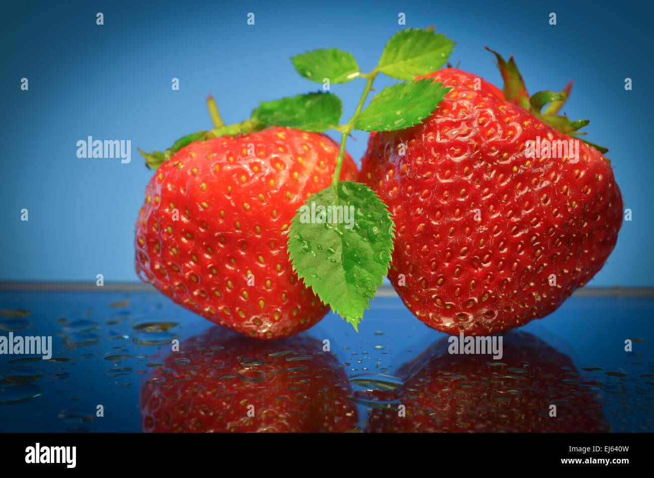 Two strawberries Stock Photo - Alamy