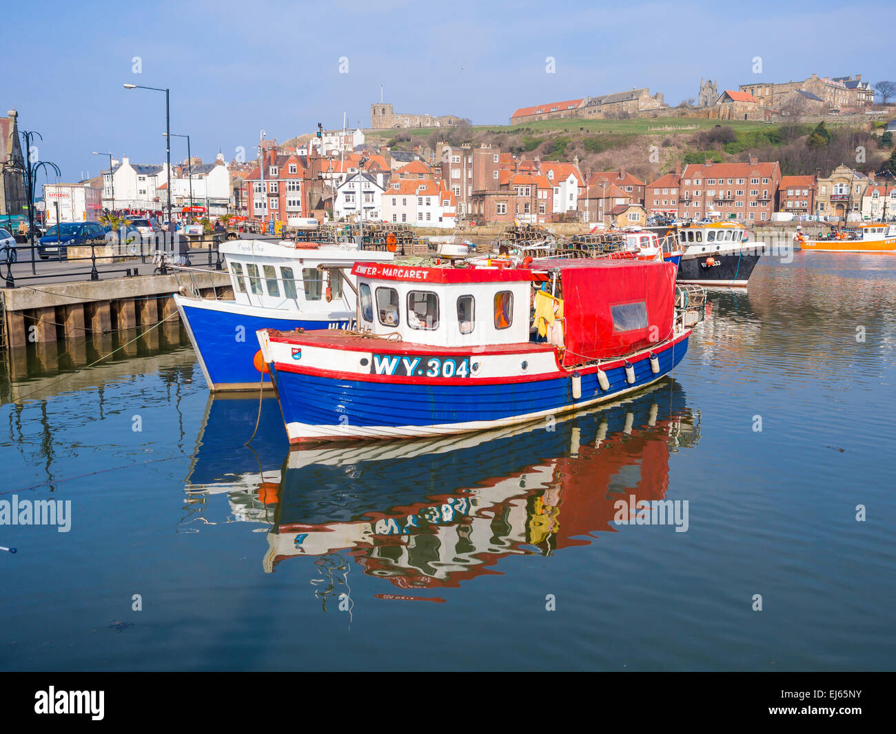Fishing boats at New Quay Wharf in Whitby harbour North Yorkshire UK ...