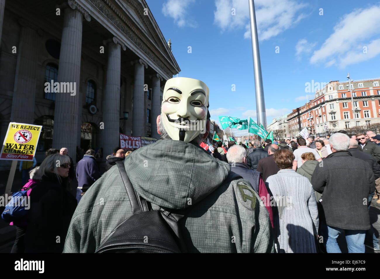 A man wears an anarchist mask on O'Connell Street during the anti-water ...