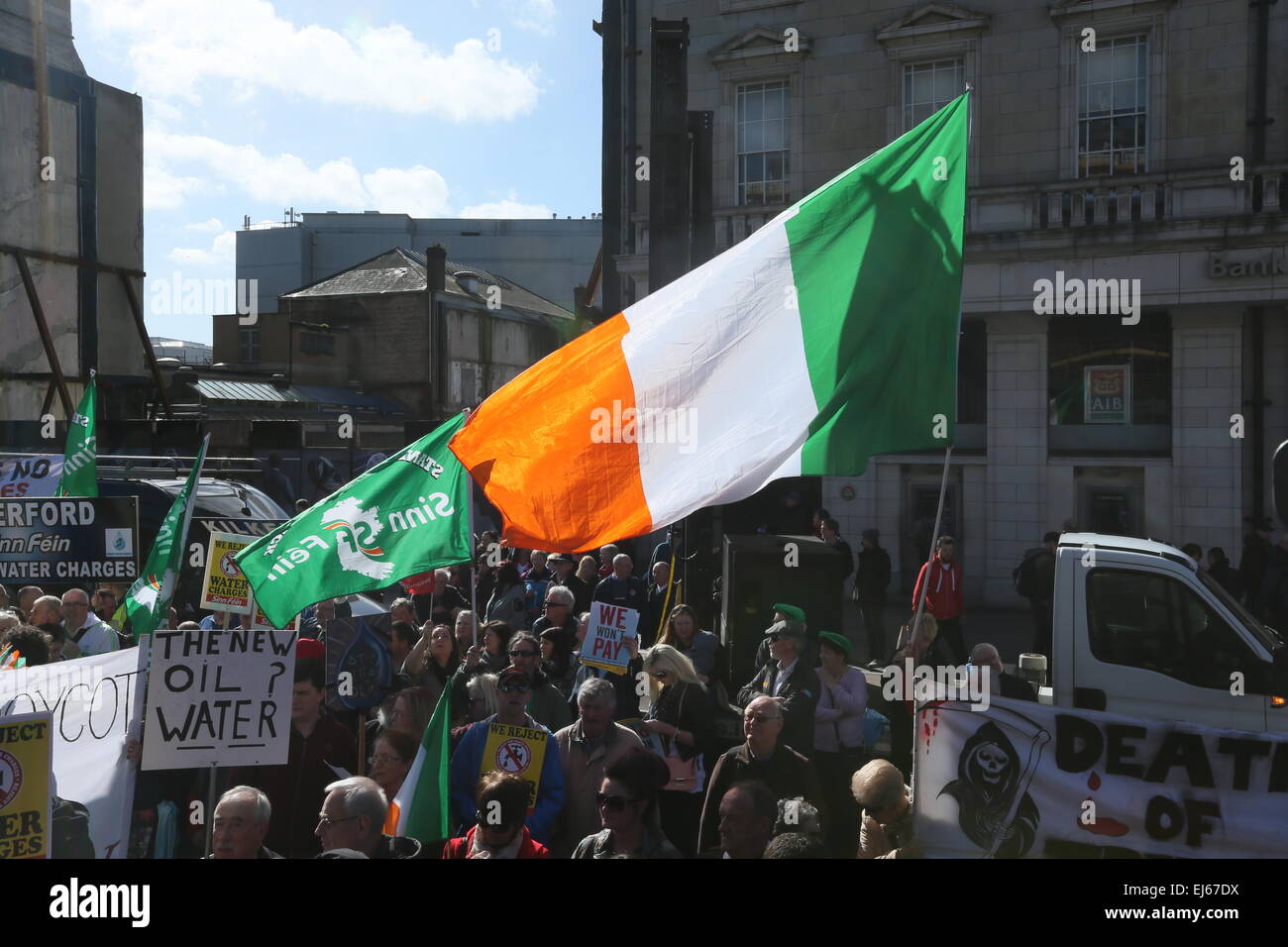 The sun shines through an Irish tricolour flag. Image from the anti ...