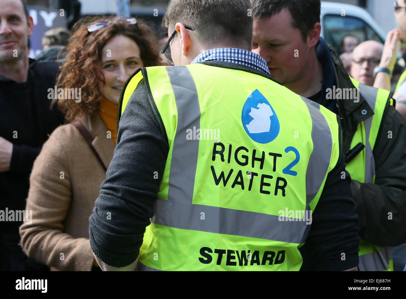 A steward wears a hi-vis vest with the Right2Water logo at the anti ...