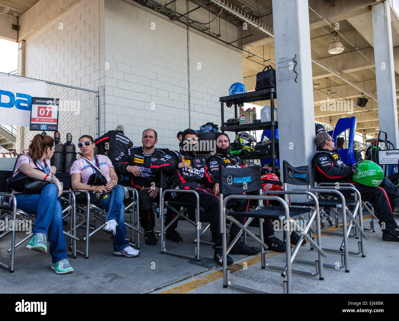 3/21/2015 - Sebring FL, USA - Team members waiting behind the pits of ...