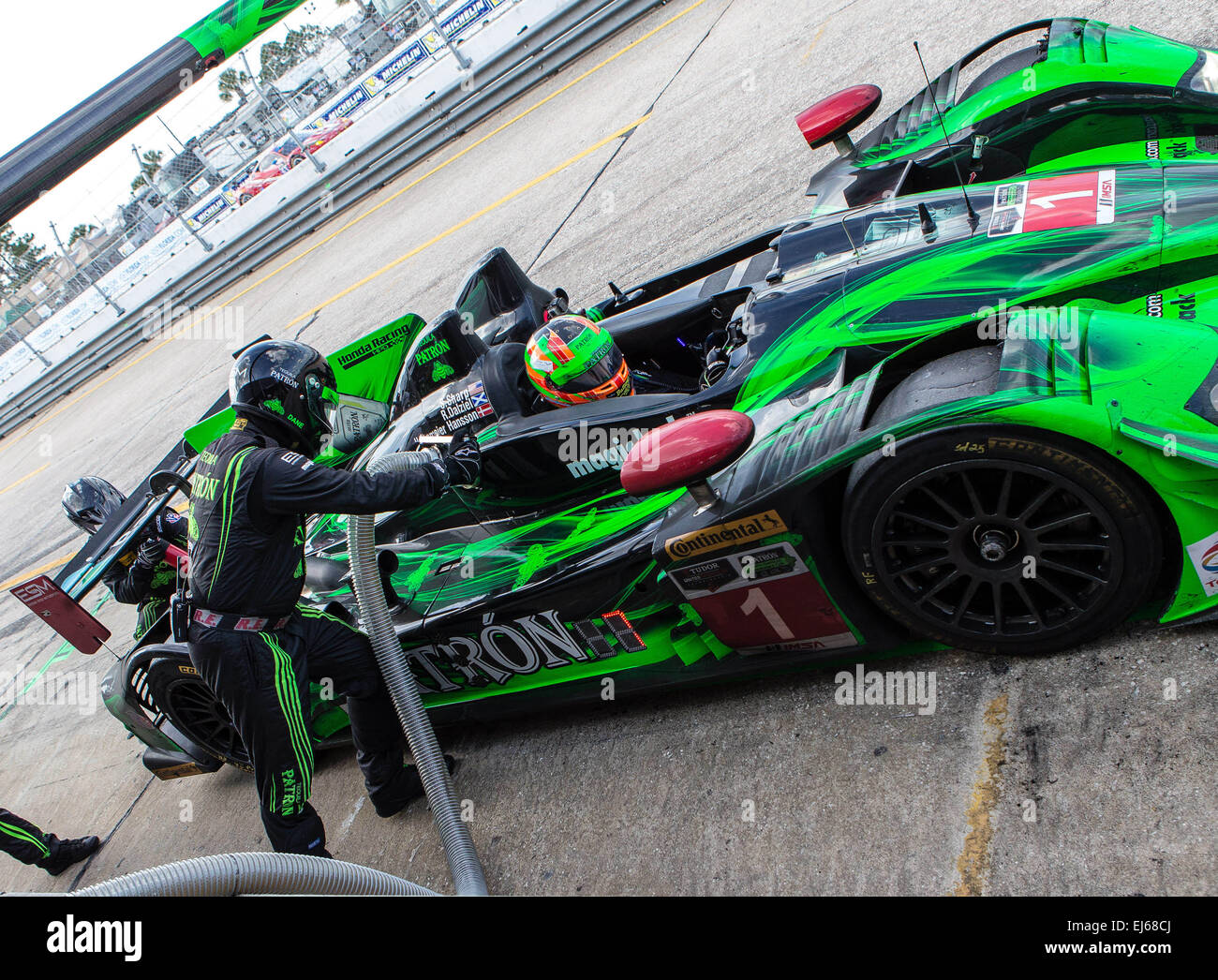 3/21/2015 - Sebring FL, USA - Pit crew topping the fuel off of car ...