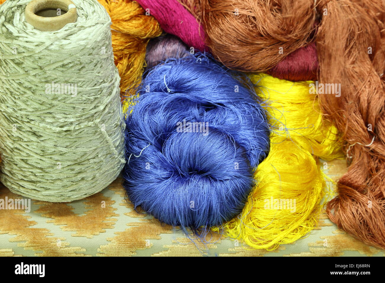 Colorful raw silk thread in the silk farm Stock Photo - Alamy