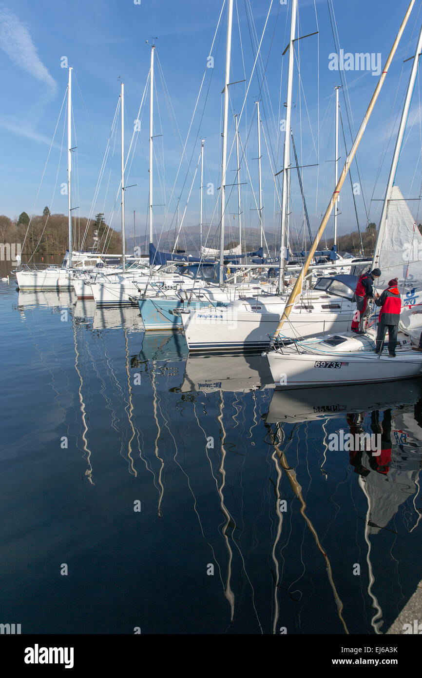 The crew of a yacht preparing the boat for sailing Stock Photo - Alamy