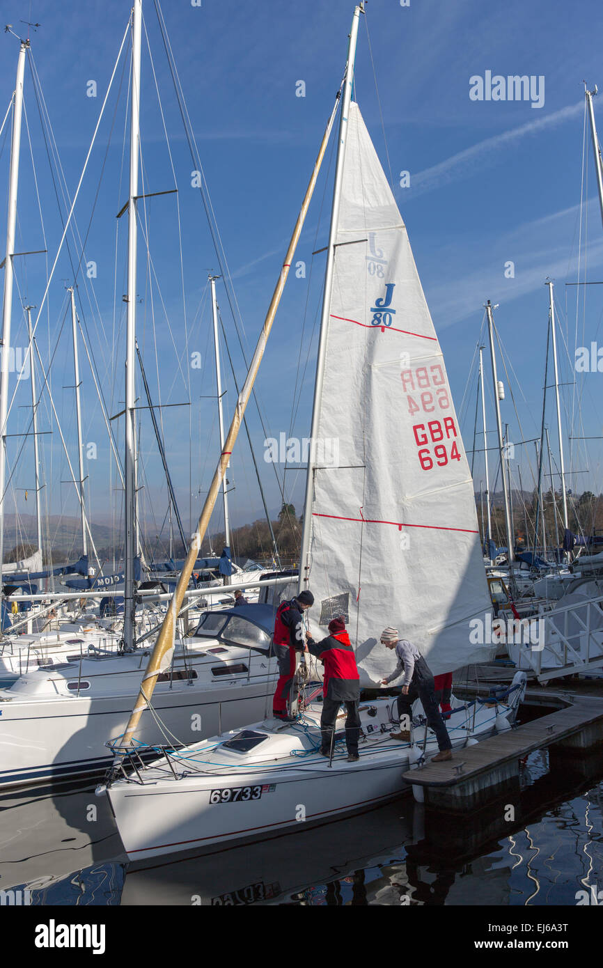 The crew of a yacht preparing the boat for sailing Stock Photo - Alamy