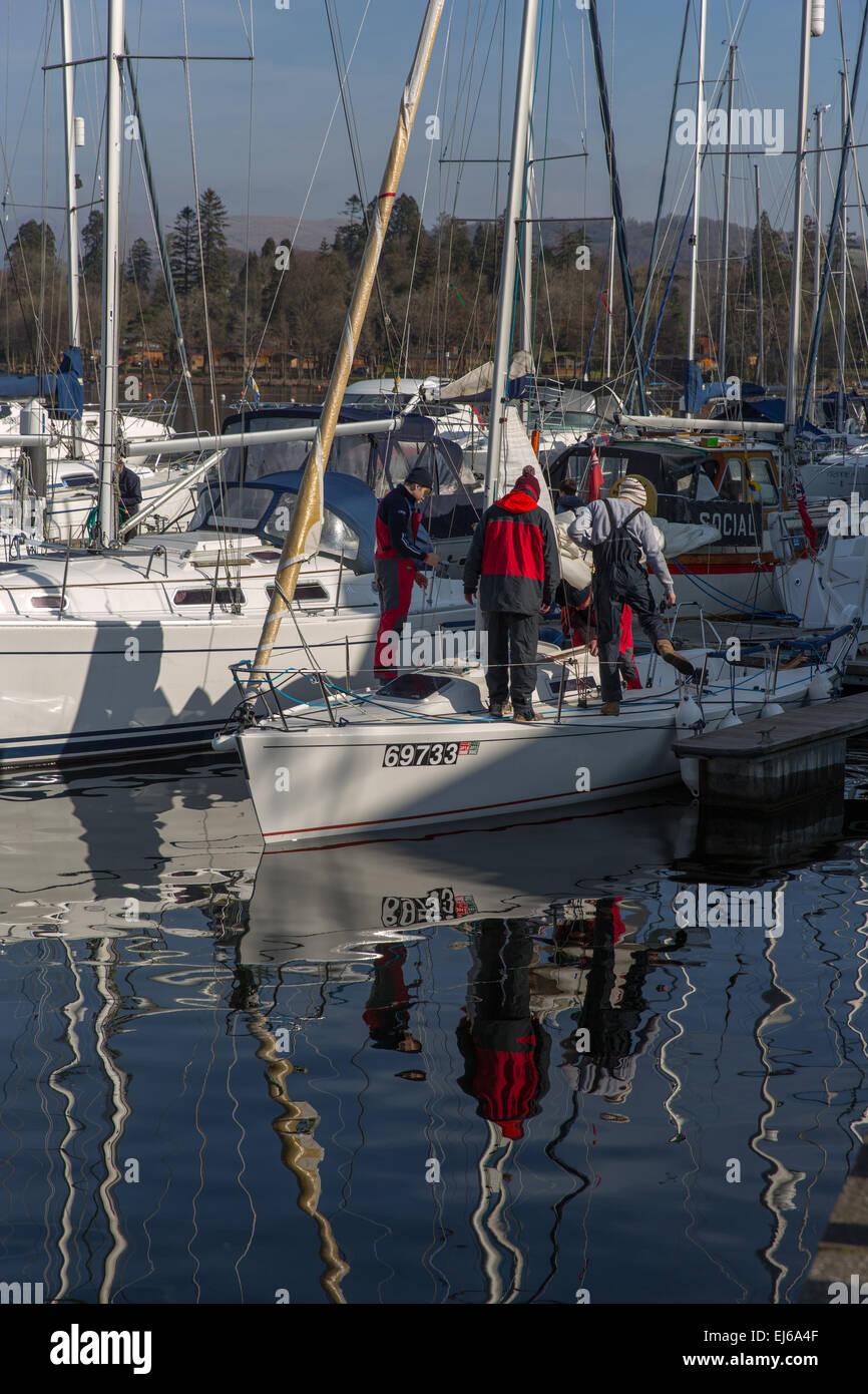 The crew of a yacht preparing the boat for sailing Stock Photo - Alamy