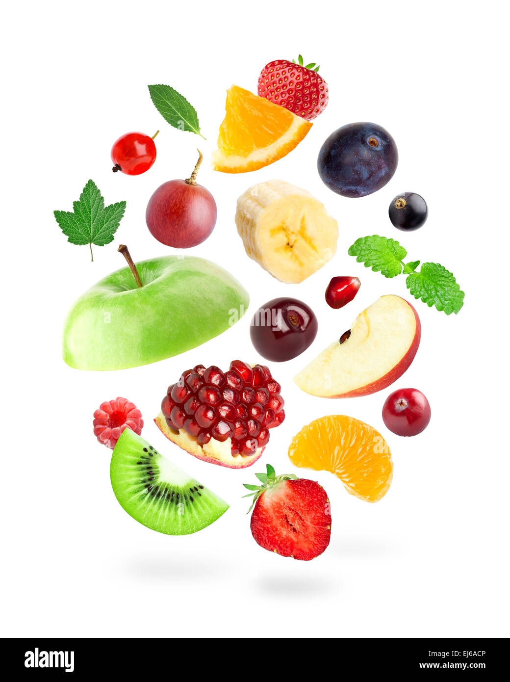 Falling fresh fruits and berries on white background Stock Photo - Alamy
