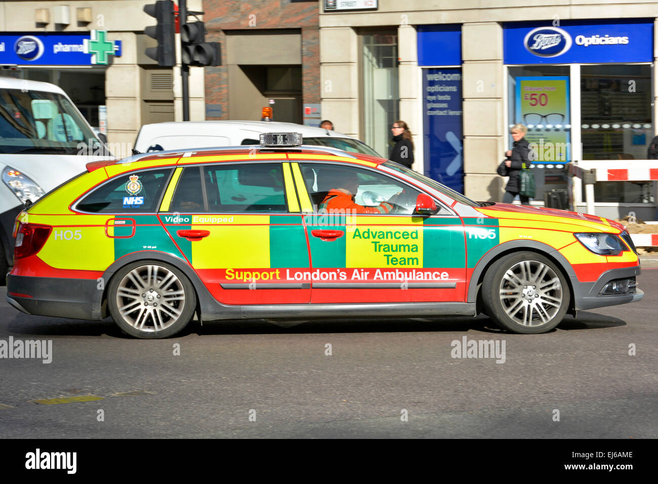 Advanced Trauma Team in NHS emergency car speeding to a 999 call for ...