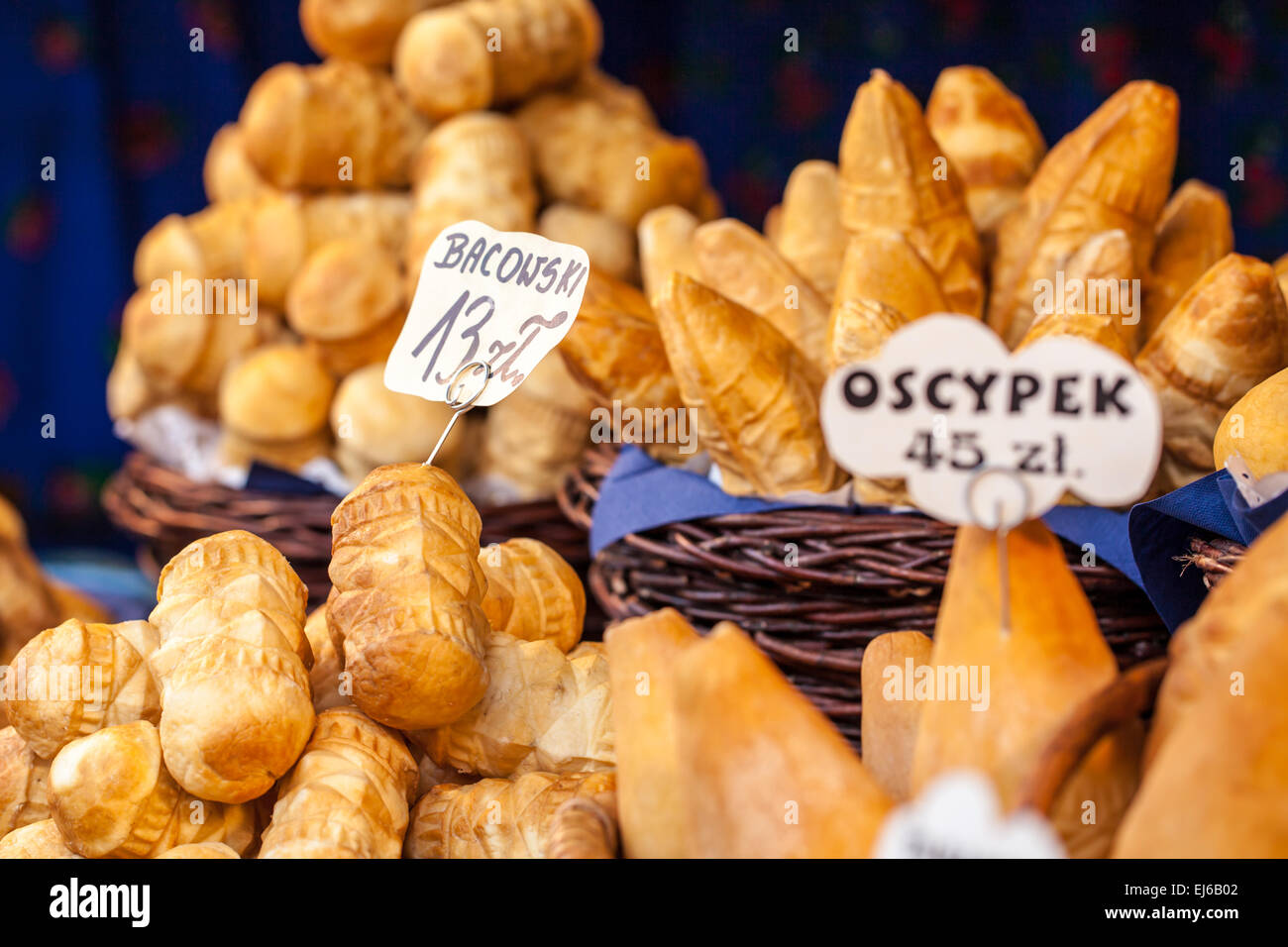 Traditional polish smoked cheese oscypek on outdoor market in Krakow ...