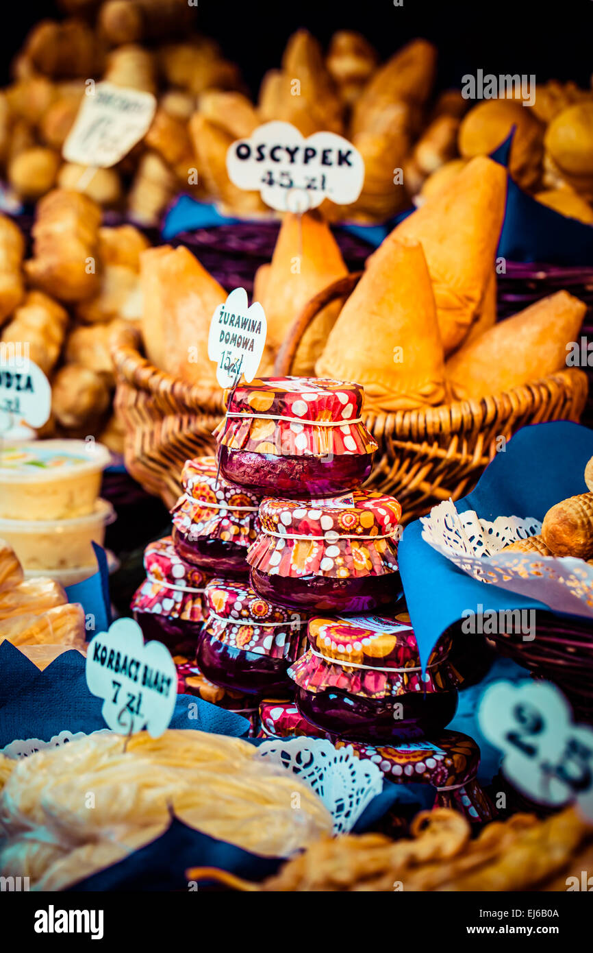 Traditional polish smoked cheese oscypek on outdoor market in Krakow ...