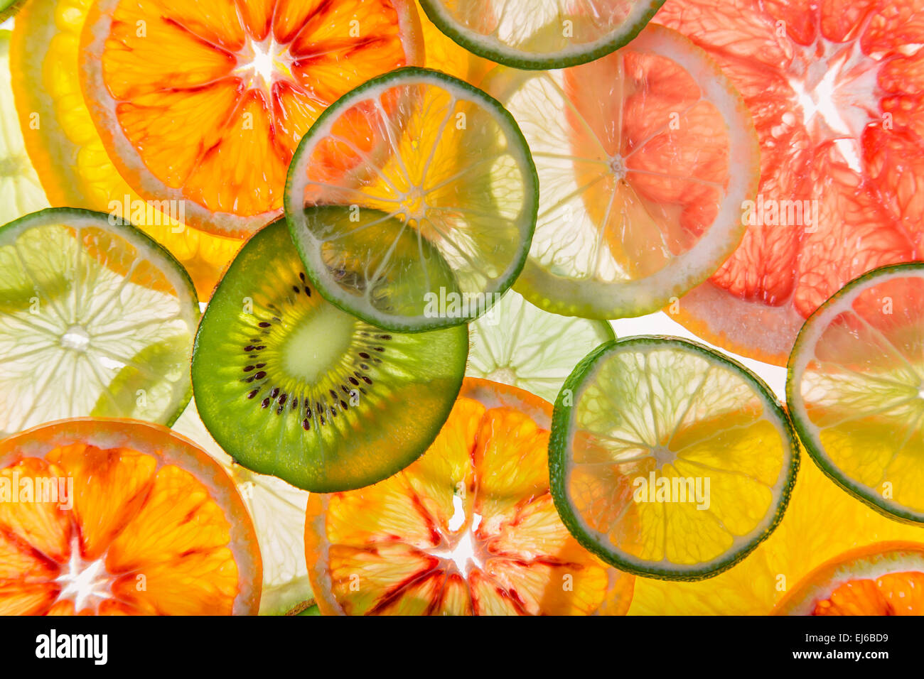 Sliced fruits background, close-up Stock Photo - Alamy