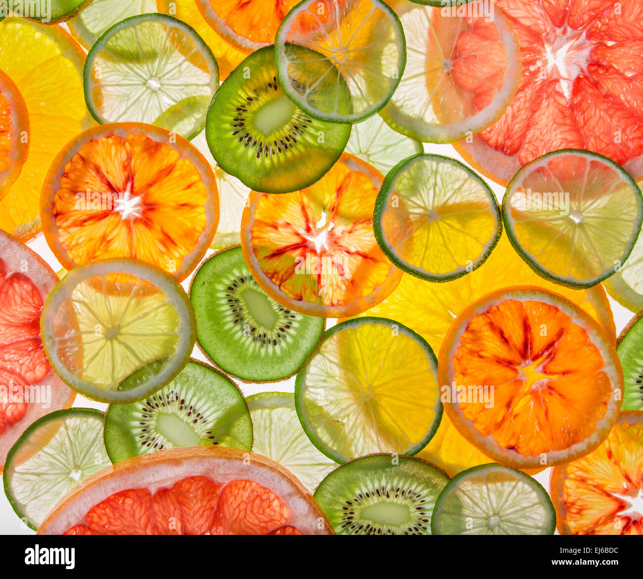 Sliced fruits background, close-up Stock Photo - Alamy