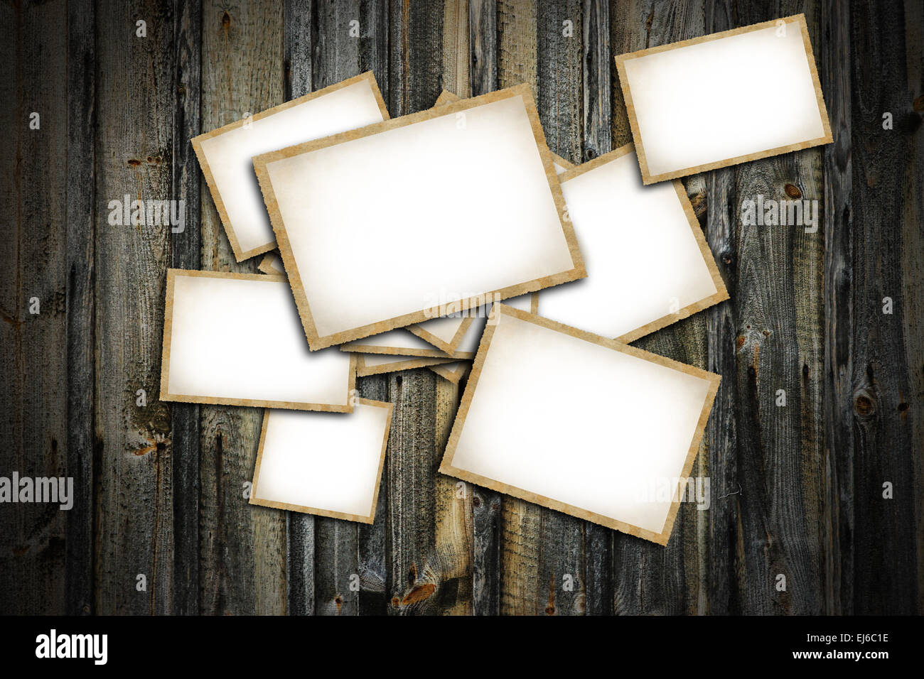Vintage blank photo frames on wooden background Stock Photo - Alamy