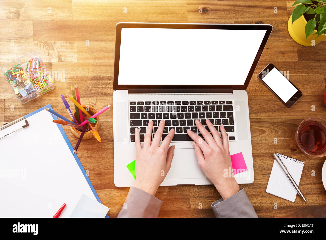 Workplace with notebook, office supplies and wooden desk Stock Photo ...