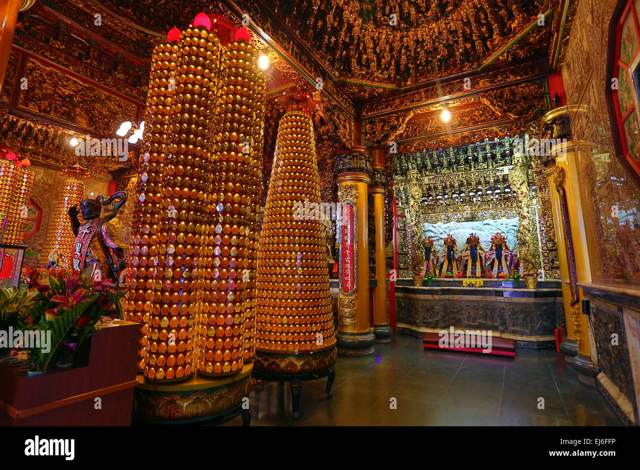 Altar with small Buddha statues at Anping Matsu Temple, dedicated to ...