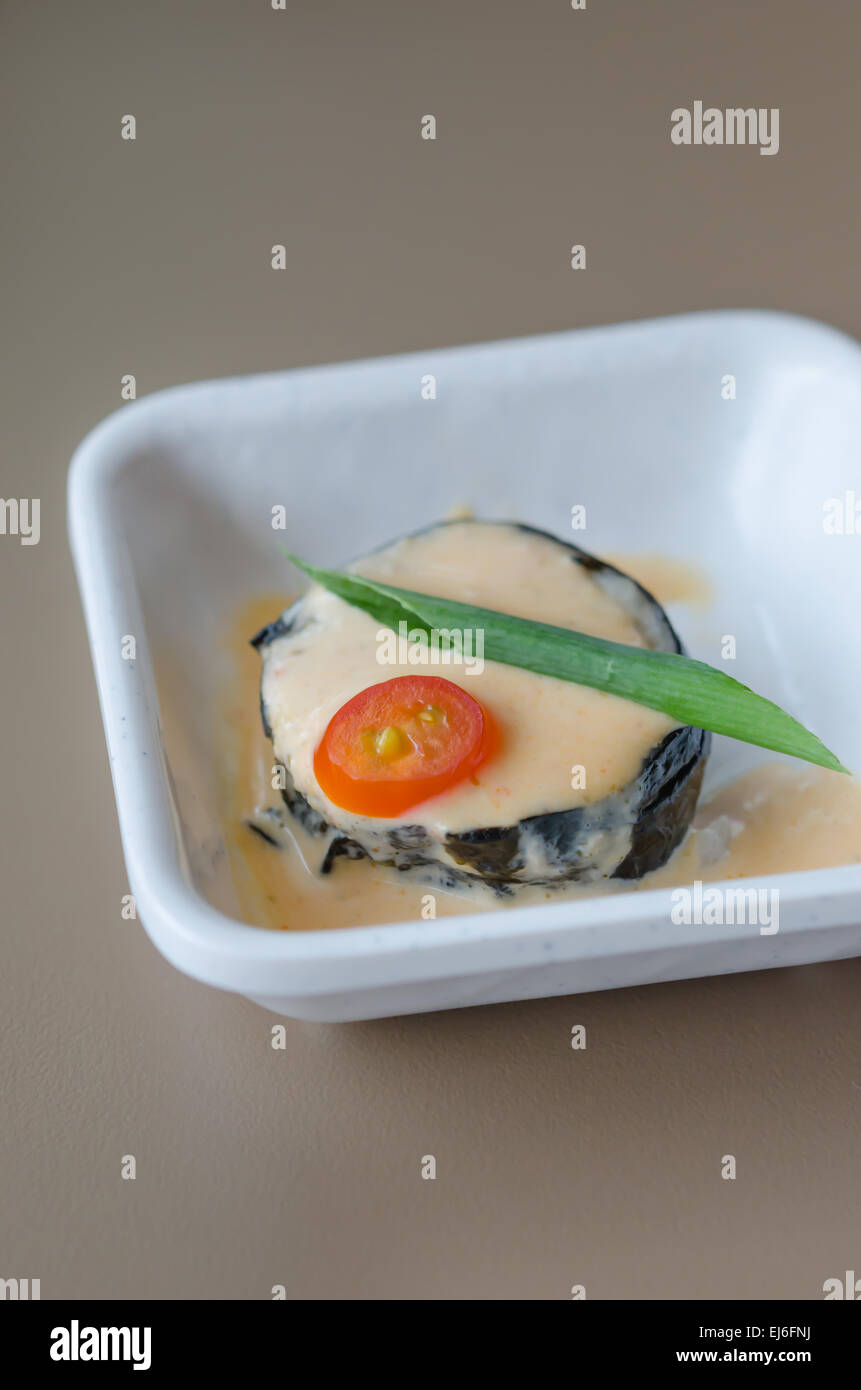 close up sushi roll with cream sauce , japanese cuisine in white bowl ...