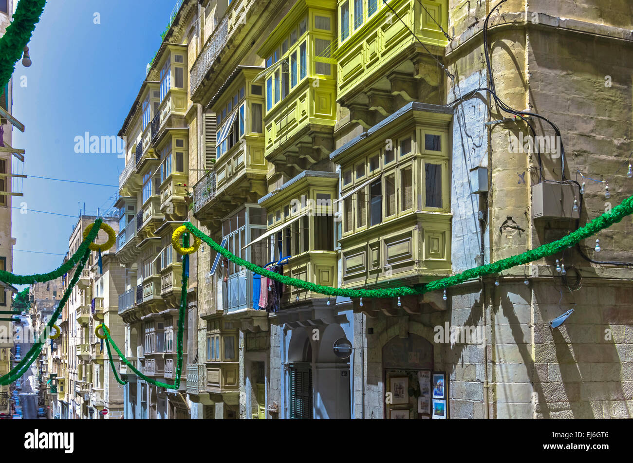 Typical Maltese residential architecture with brightly coloured timber ...