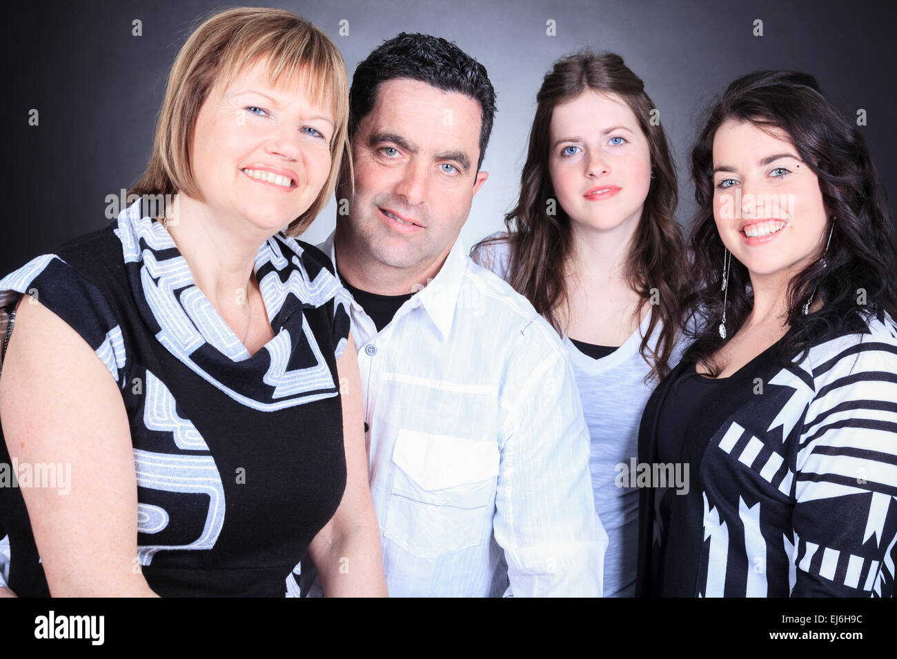 Family portrait studio background hi-res stock photography and images ...
