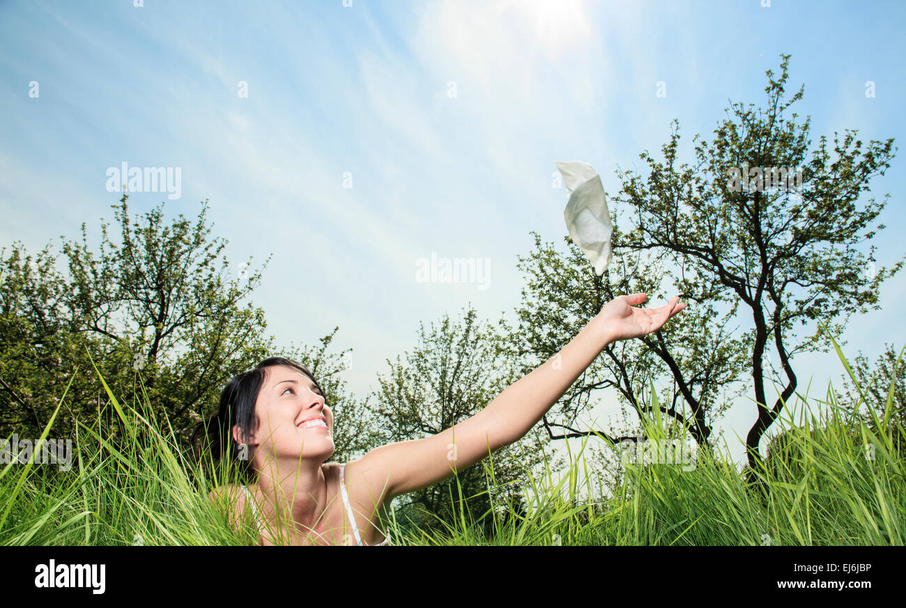 Woman sending handkerchief on the air Stock Photo - Alamy
