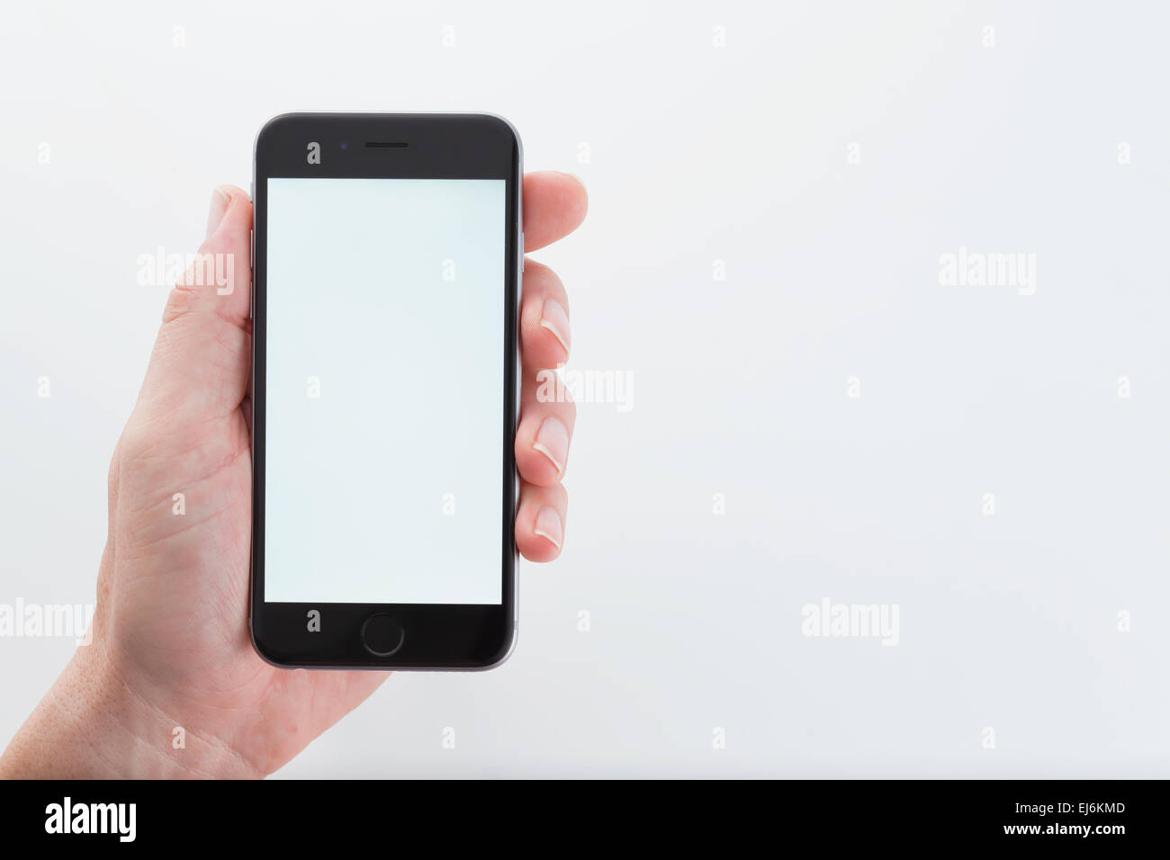 Man holding smartphone Stock Photo - Alamy