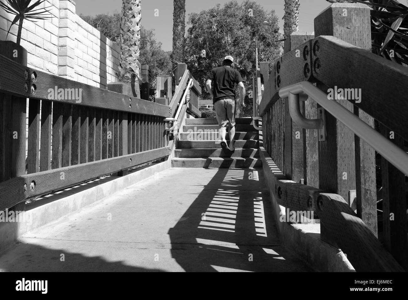 Sign sun on sand beach Black and White Stock Photos & Images - Alamy