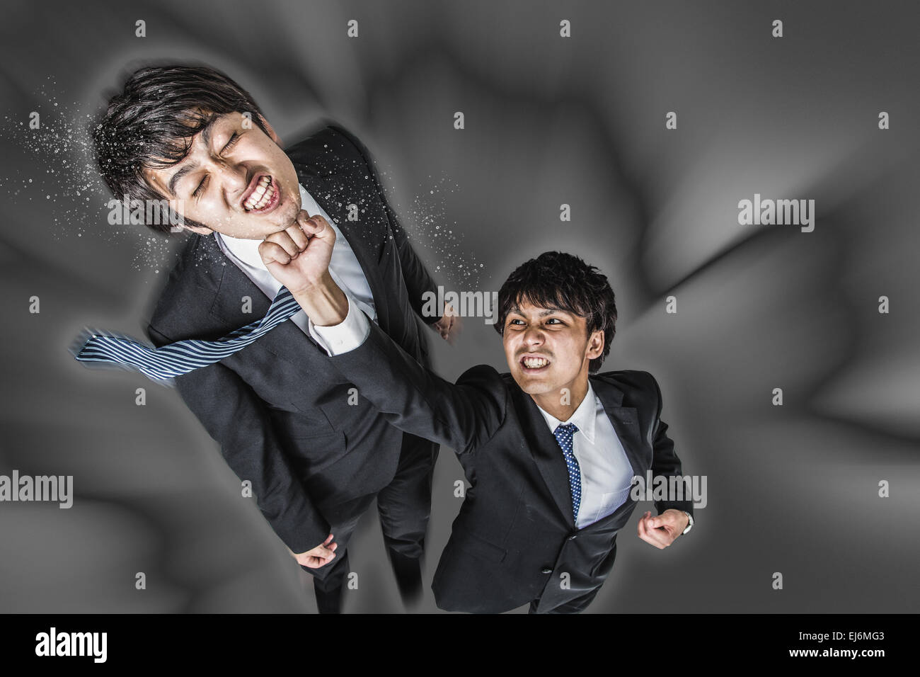 Japanese businessmen fighting extremely Stock Photo - Alamy