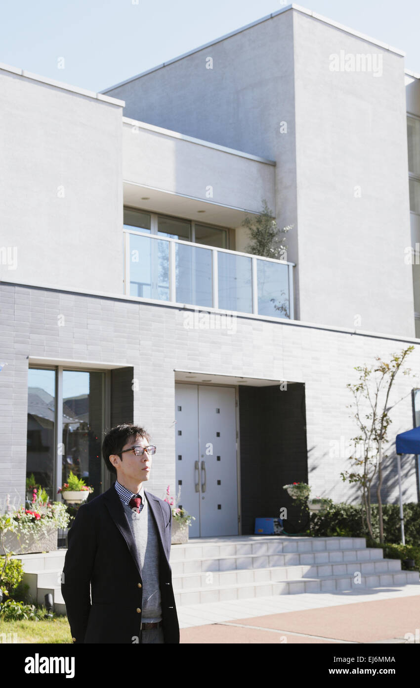 Young Japanese real estate agent working Stock Photo - Alamy