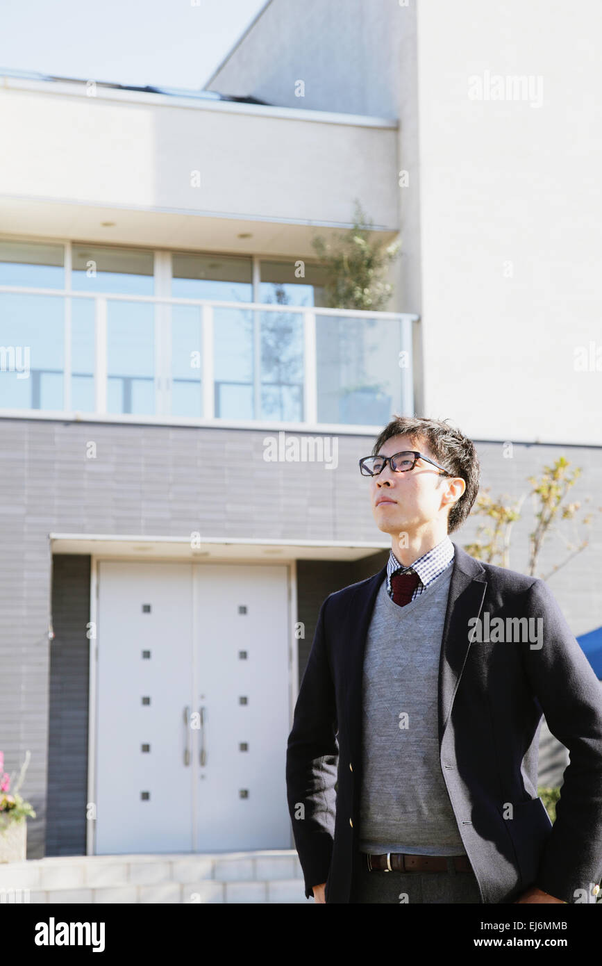 Young Japanese real estate agent working Stock Photo - Alamy