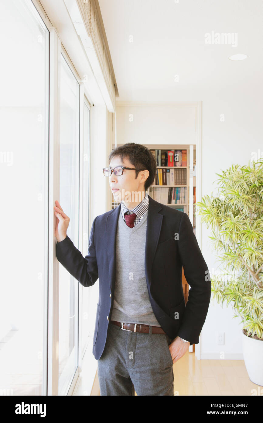 Young Japanese real estate agent working Stock Photo - Alamy