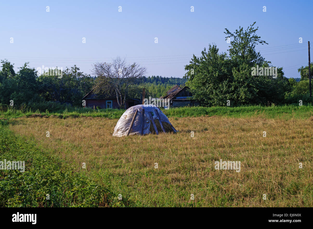 Haystack in village Stock Photo - Alamy