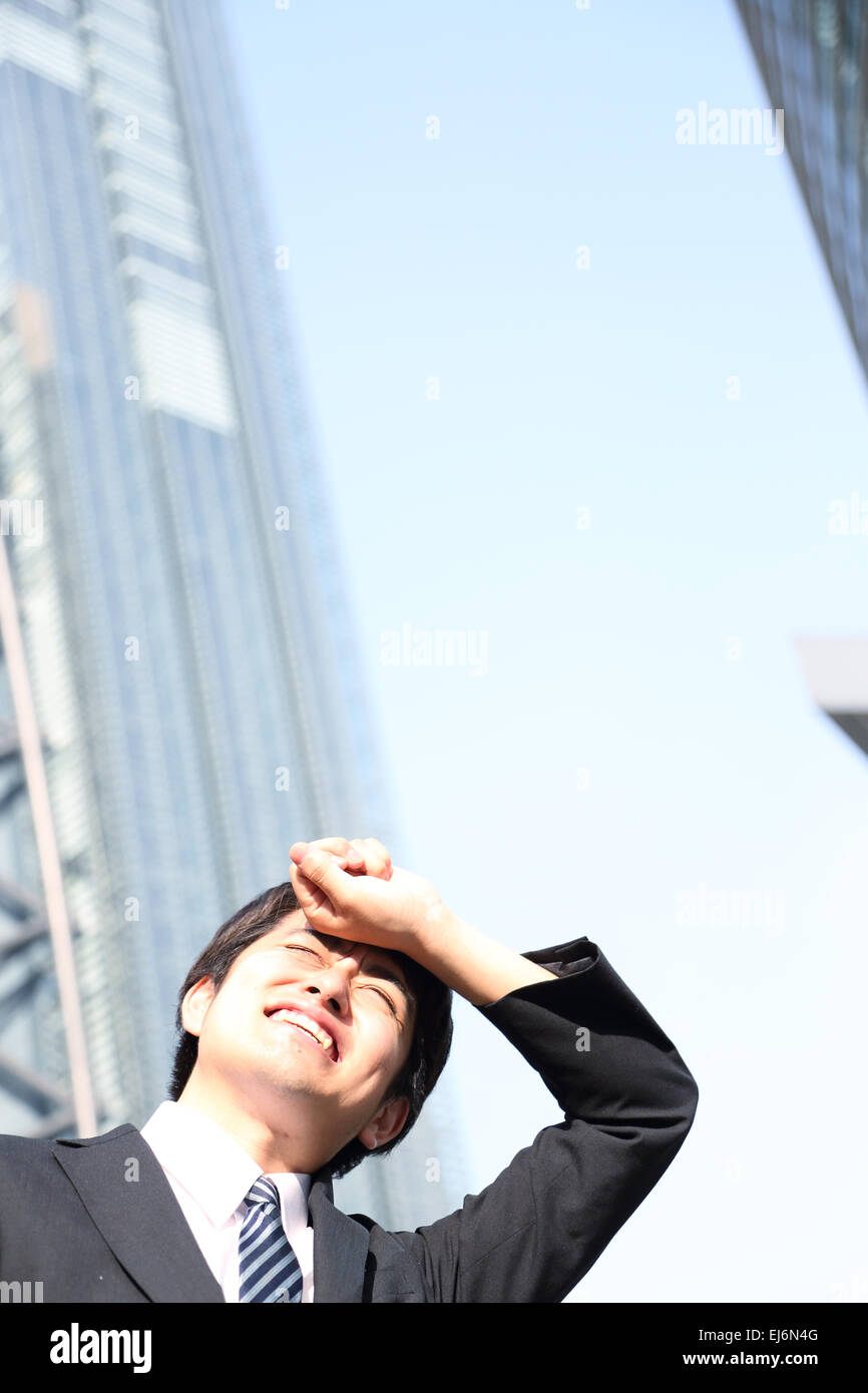 Japanese businessman tired during the hot Japanese Summer Stock Photo ...