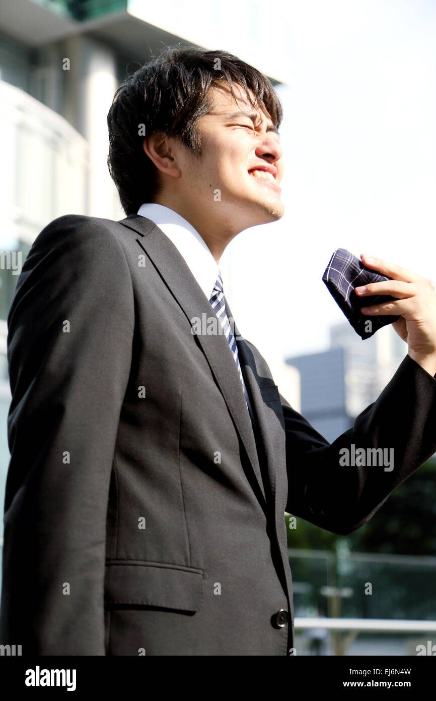 Japanese businessman tired during the hot Japanese Summer Stock Photo ...