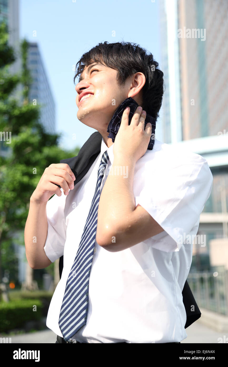 Japanese businessman tired during the hot Japanese Summer Stock Photo ...