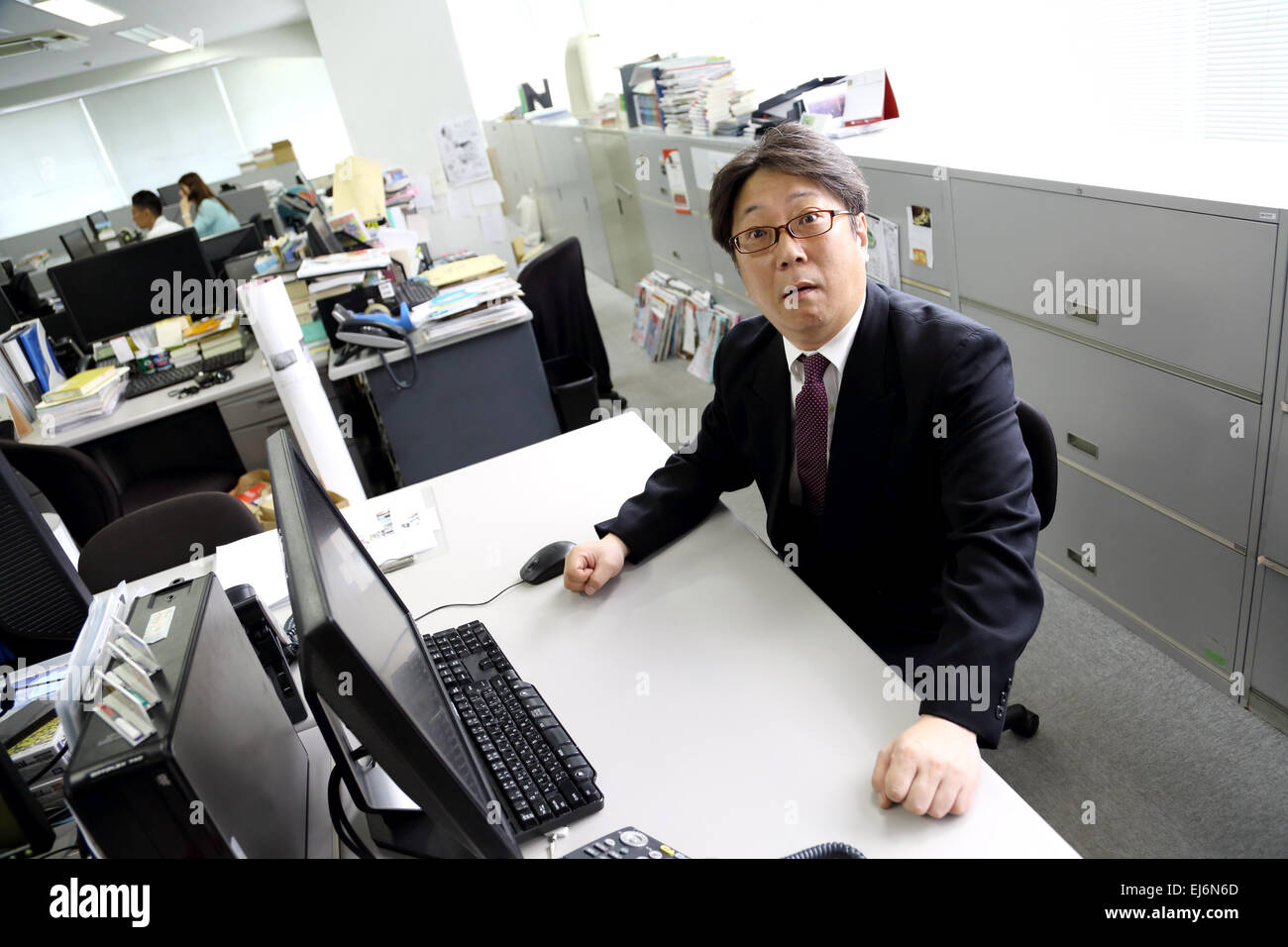 Japanese boss in the office Stock Photo - Alamy