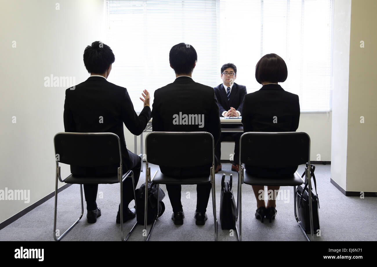Young Japanese business people work examination Stock Photo - Alamy