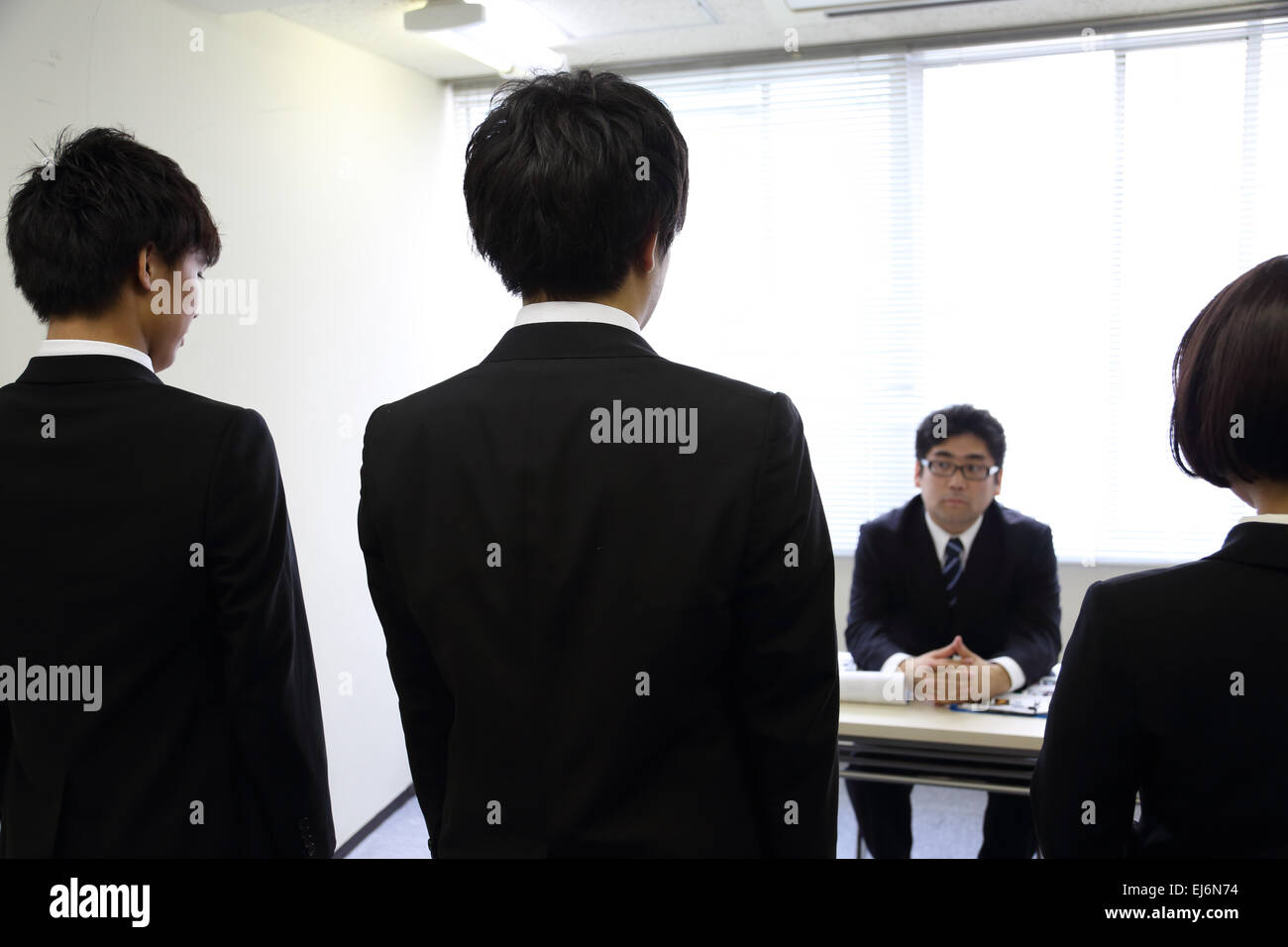 Young Japanese business people work examination Stock Photo - Alamy