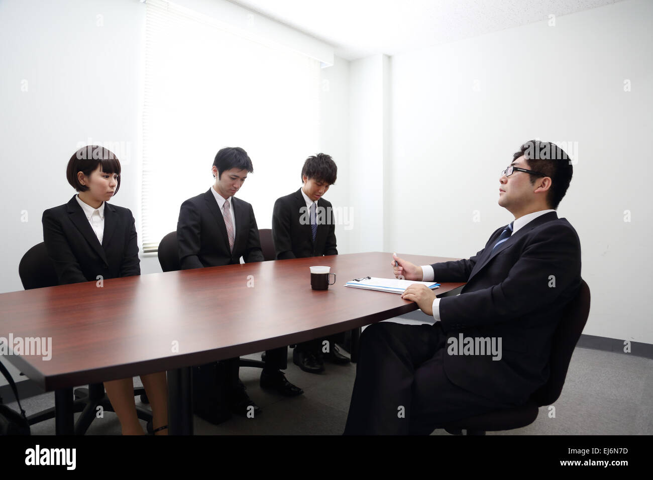 Young Japanese business people work examination Stock Photo - Alamy