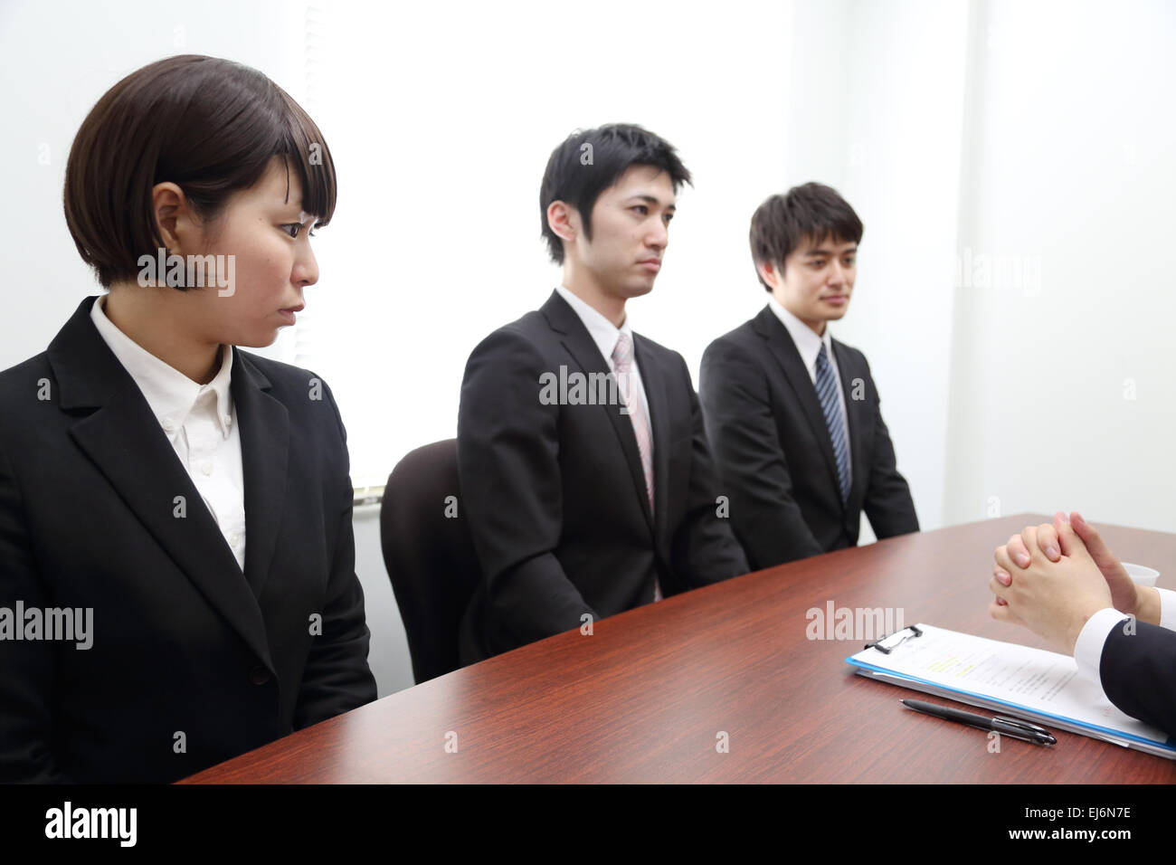 Young Japanese business people work examination Stock Photo - Alamy
